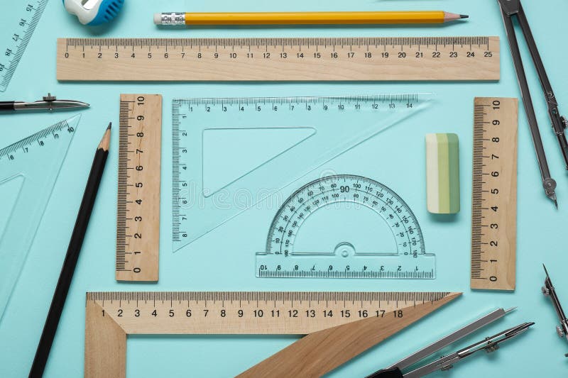 Different Rulers and Compass on Light Blue Background, Flat Lay Stock ...