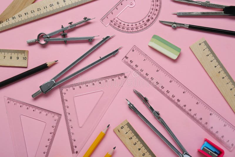 Flat Lay Composition with Different Rulers and Stationery on Pink ...