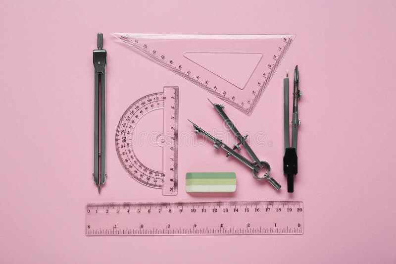 Flat Lay Composition with Different Rulers and Stationery on Pink ...