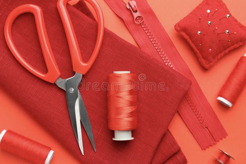 Flat Lay Composition with Different Sewing Supplies on Coral Background ...