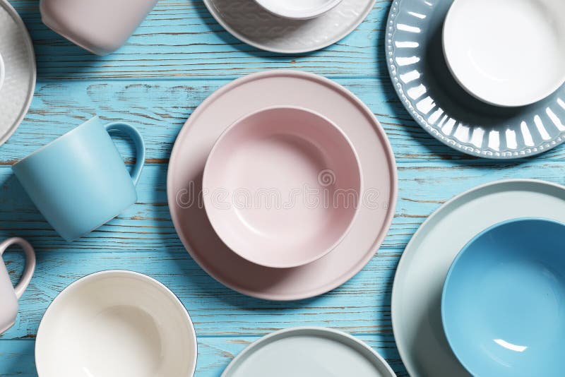 Flat Lay Composition with Dishware and Cutlery on Blue Table Stock ...