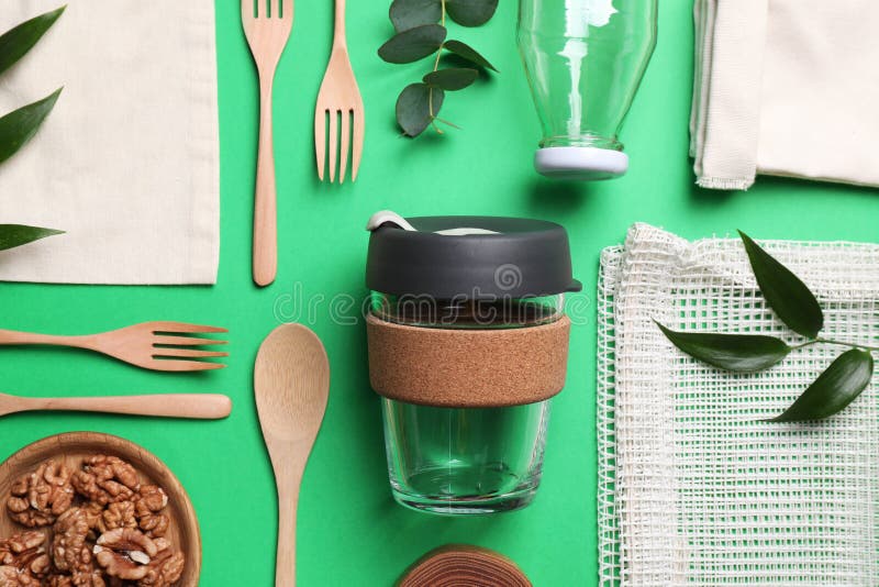 Flat Lay Composition with Eco Friendly Products on Green Background ...