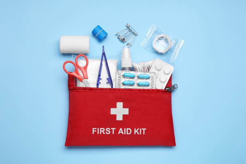 Flat Lay Composition with First Aid Kit on Light Blue Background Stock ...