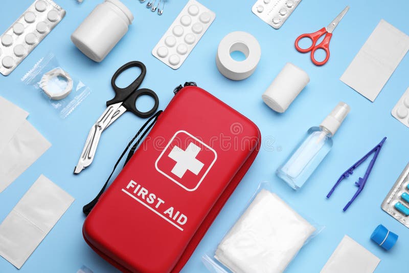 Flat Lay Composition with First Aid Kit on Light Blue Background Stock ...