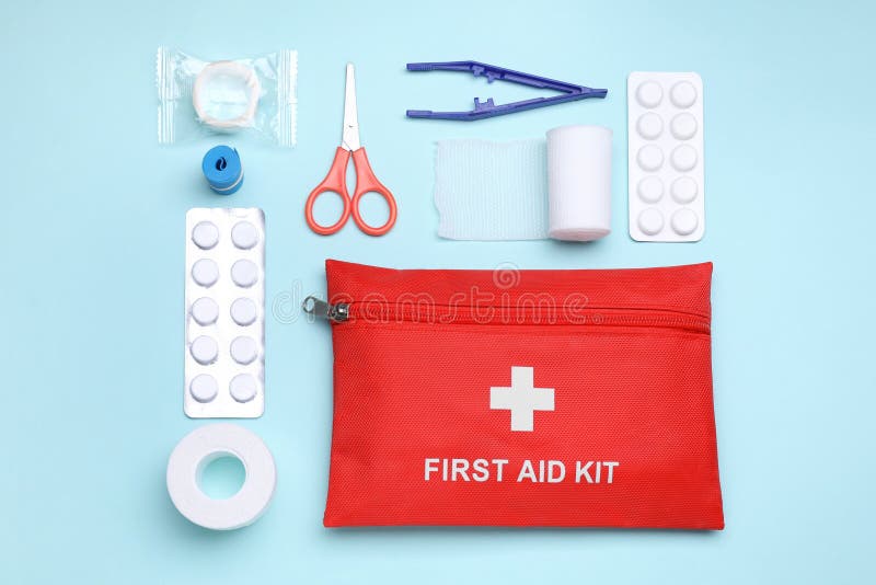 Flat Lay Composition with First Aid Kit on Light Blue Background Stock ...