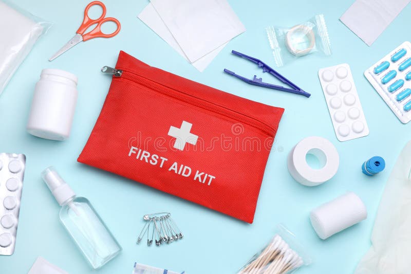 Flat Lay Composition with First Aid Kit on Light Blue Background Stock ...