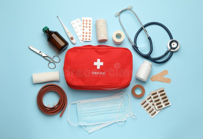 Flat Lay Composition with First Aid Kit on Light Blue Background Stock ...