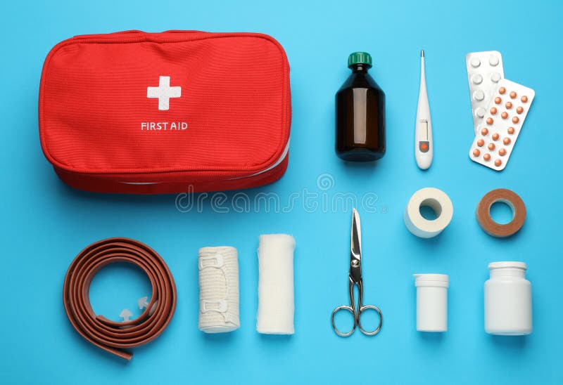 Flat Lay Composition with First Aid Kit on Light Blue Background Stock ...