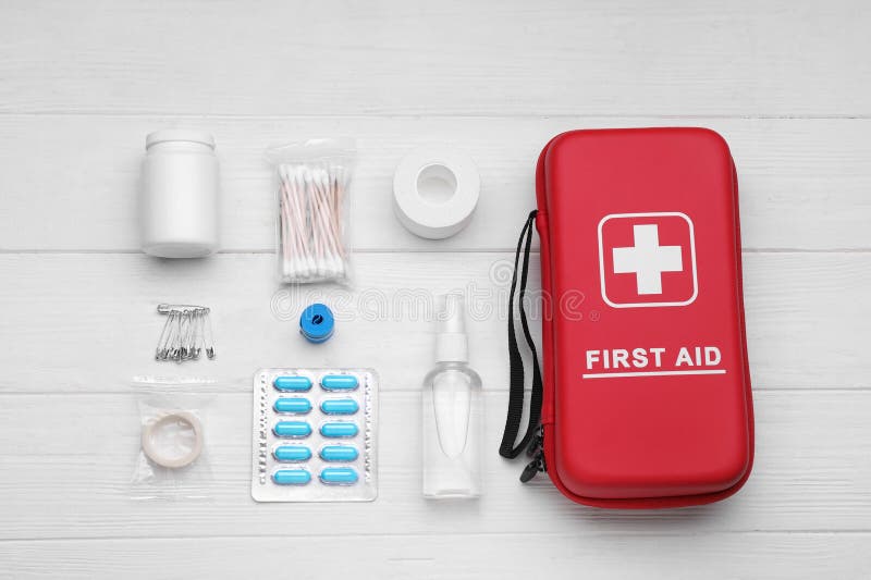Flat Lay Composition with First Aid Kit on White Wooden Table Stock ...