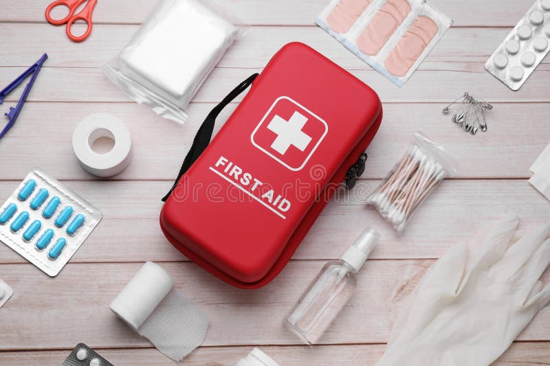 Flat Lay Composition with First Aid Kit on Wooden Table Stock Image ...