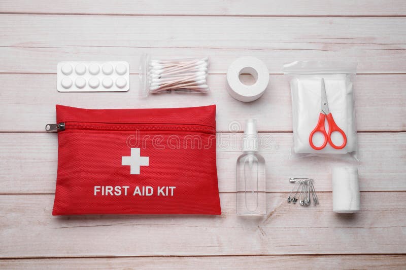Flat Lay Composition with First Aid Kit on Wooden Table Stock Image ...