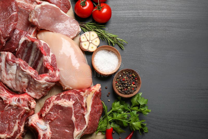 Flat Lay Composition with Fresh Meat on Dark Table Stock Photo - Image ...
