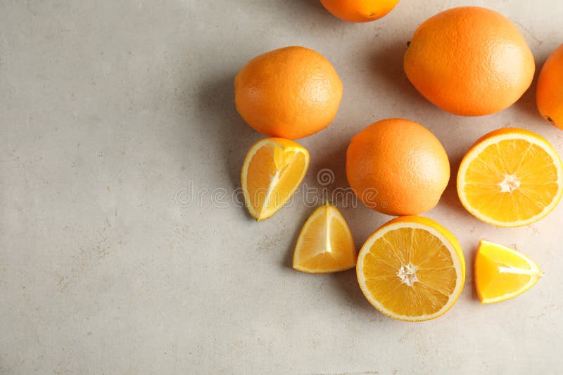 Flat Lay Composition with Fresh Oranges on Grey Table. Stock Photo ...