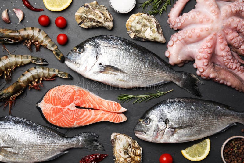 Flat Lay Composition with Fresh Raw Dorado Fish and Different Seafood ...