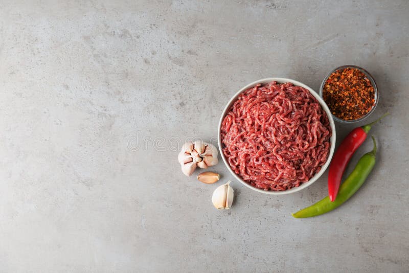 Flat Lay Composition with Fresh Raw Minced Meat on Light Table Stock ...