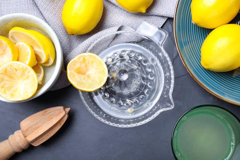 Flat Lay Composition with Freshly Squeezed Lemon Juice on Table Stock ...