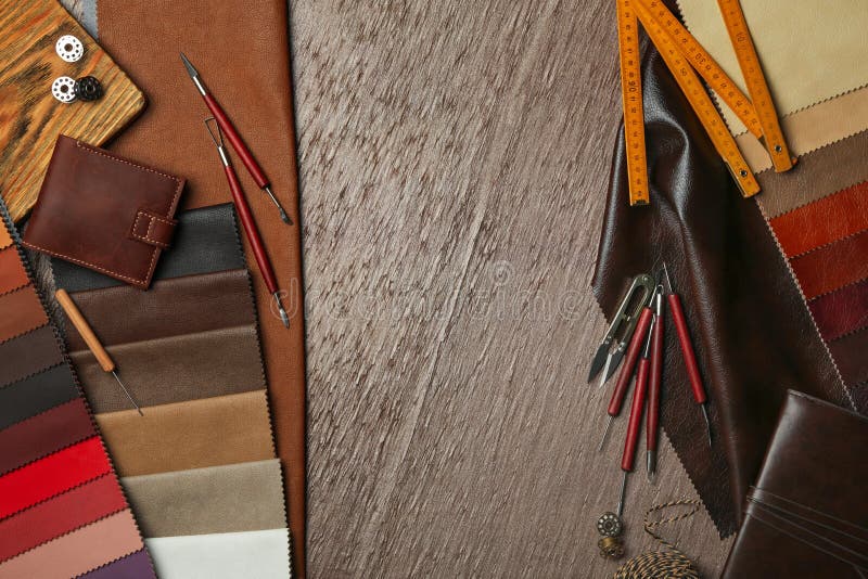 Flat Lay Composition with Leather Samples and Tools on Brown Table ...