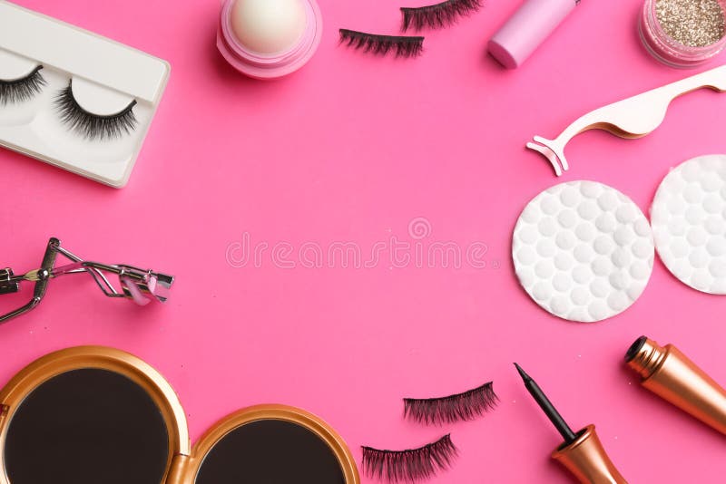 Flat Lay Composition with Magnetic Eyelashes and Accessories on Crimson ...