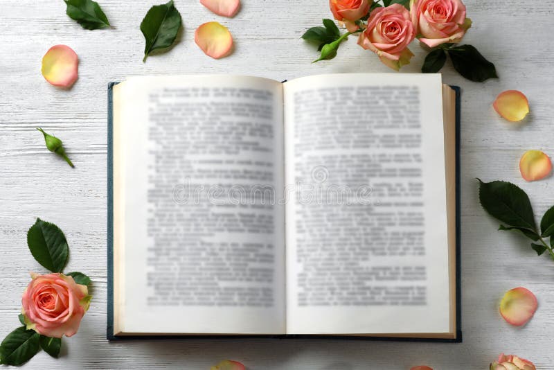 Flat Lay Composition with Open Hardcover Book and Flowers on White ...
