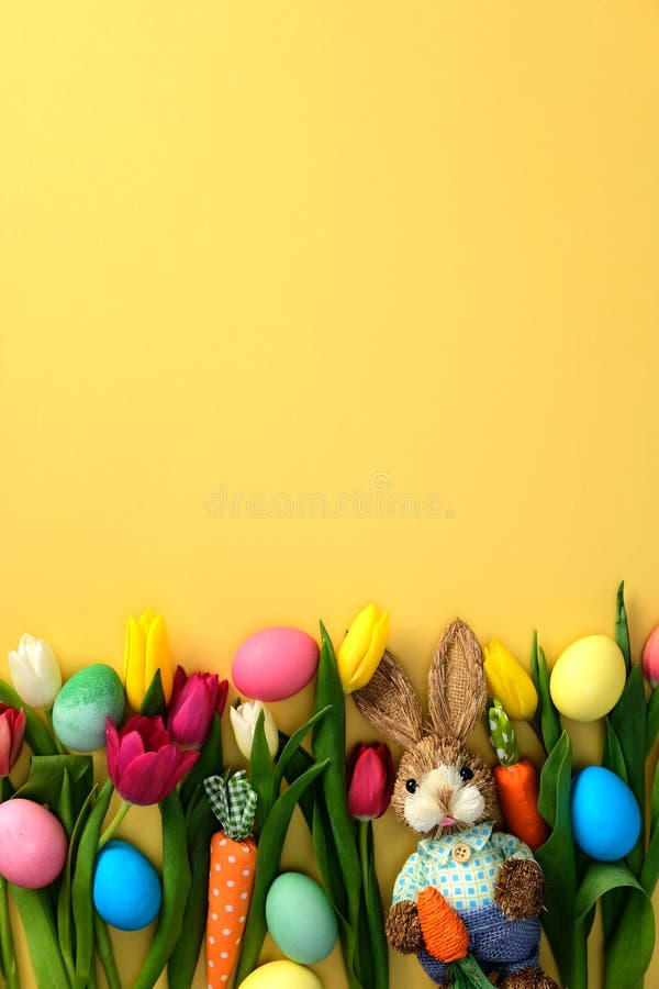 Flat Lay Composition with Painted Easter Eggs, Tulips, Bunny on Yellow Background Stock Photo ...