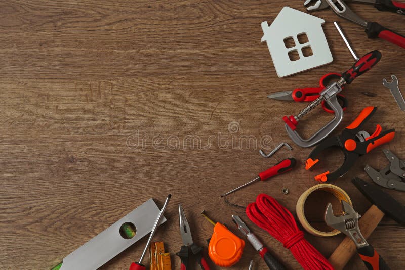 Flat Lay Composition with Repair Tools on Wooden Table Stock Image ...