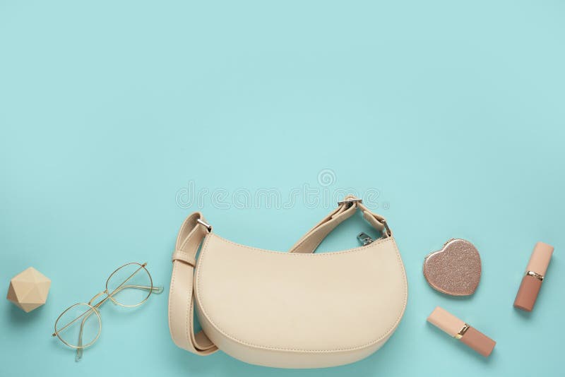 Flat Lay Composition with Stylish Baguette Handbag on Light Blue ...