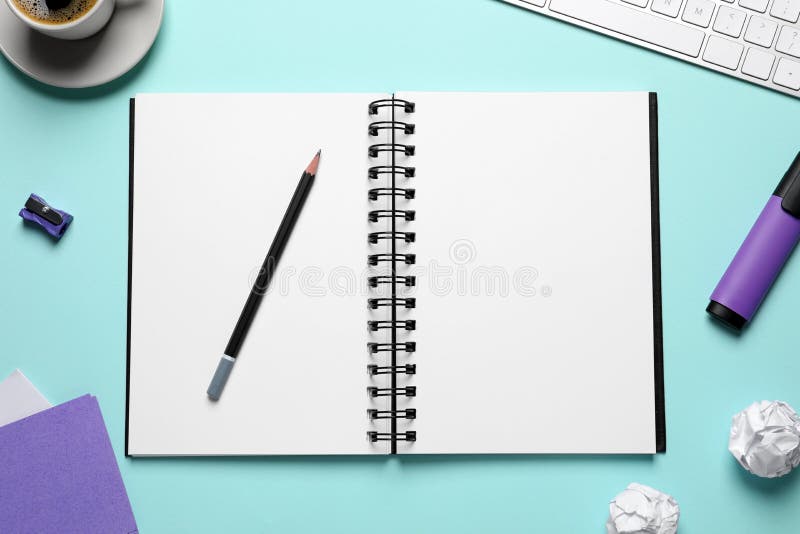 Flat Lay Composition with Stylish Notebook on Light Blue Background ...