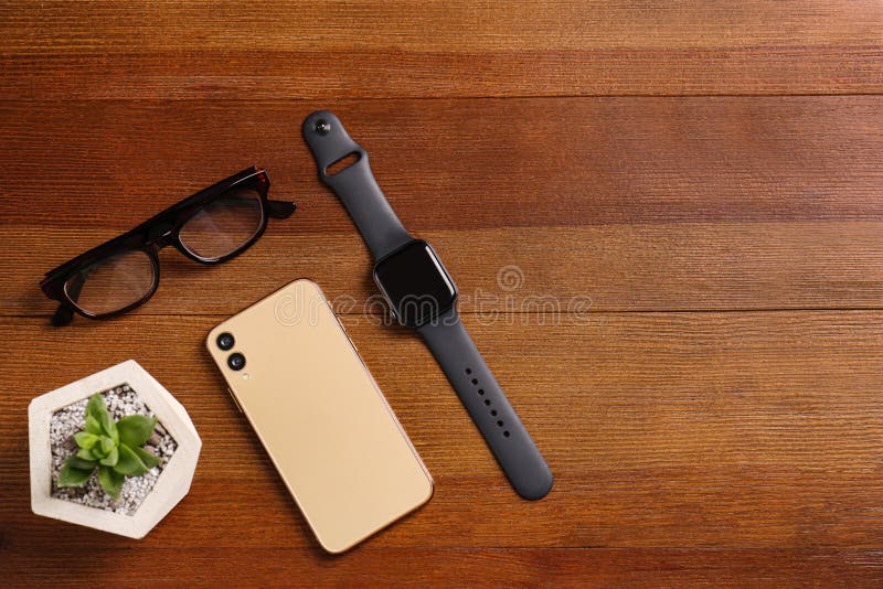 Flat Lay Composition with Stylish Smart Watch on Wooden Table. Space ...