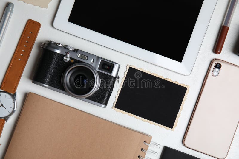 Flat Lay Composition with Tablet, Camera and Smartphone on Table ...