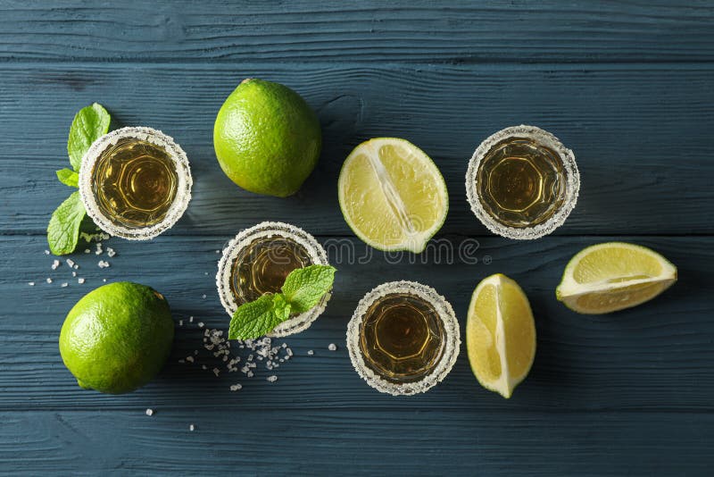 Flat Lay Composition with Tequila Shots, Salt, Lime Slices and Mint ...