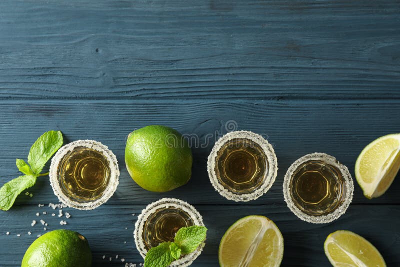 Flat Lay Composition with Tequila Shots, Salt, Lime Slices and Mint ...