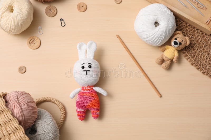 Flat Lay Composition with Threads and Crocheted Toys on Wooden Table ...