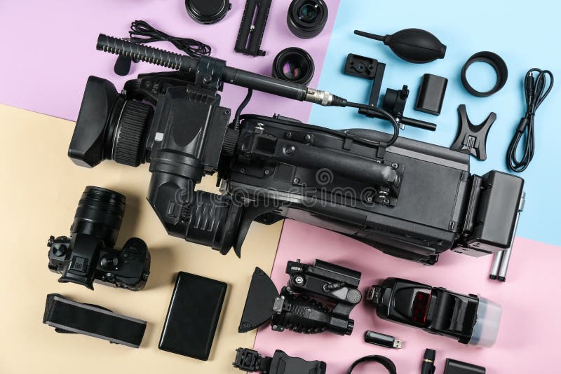 Flat Lay Composition with Video Camera and Equipment on Color ...