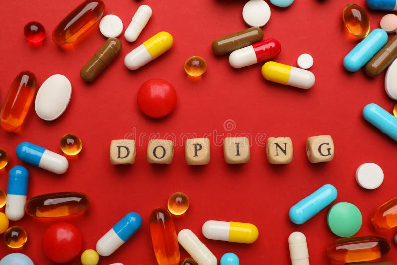Flat Lay Composition with Word Doping and Drugs on Red Background Stock ...