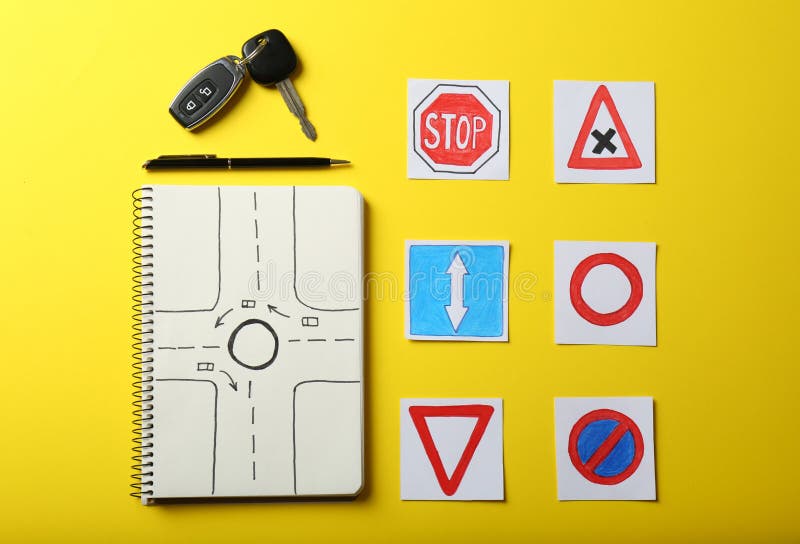 Flat Lay Composition with Workbook for Driving Lessons and Road Signs ...