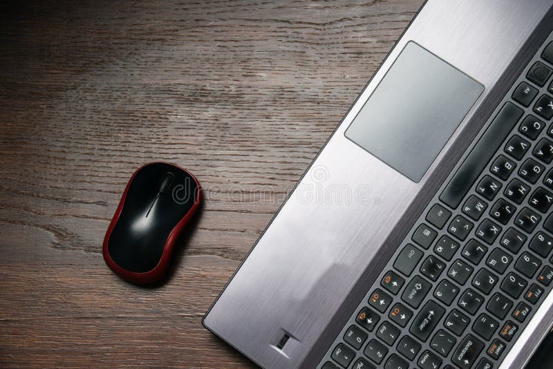 Flat Lay, Computer Mouse and Laptop on Wooden Table, Copy Space Stock ...
