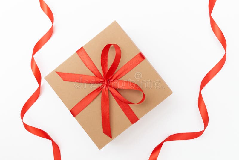 Flat Lay of Craft Present Box with Red Bow and Ribbons on the White ...