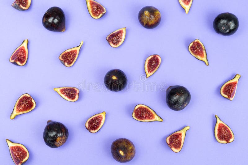 Flat Lay of Cut and Whole Figs on a Blue Background. Copy Space Stock ...