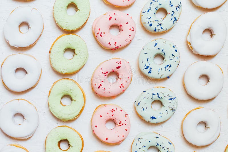 Flat Lay Donuts Pattern on a White Background. Stock Image - Image of ...