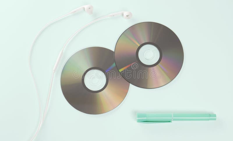 Flat Lay Green Color Pen and CD Stock Image - Image of headphones ...