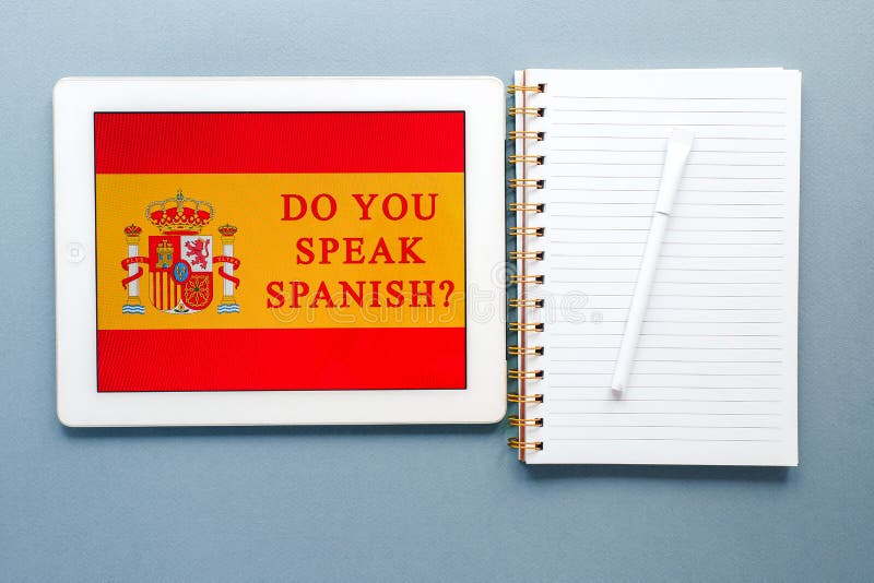 Learning Spanish on the Internet: a Notebook, Pen and Tablet Stock ...