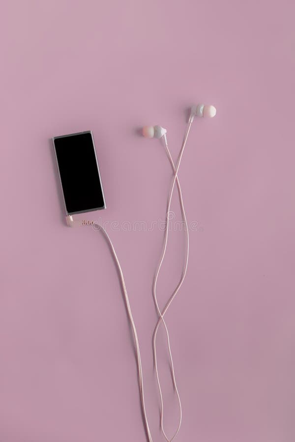 Flat Lay of Modern Music Player Device and Earphones, Minimalistic ...