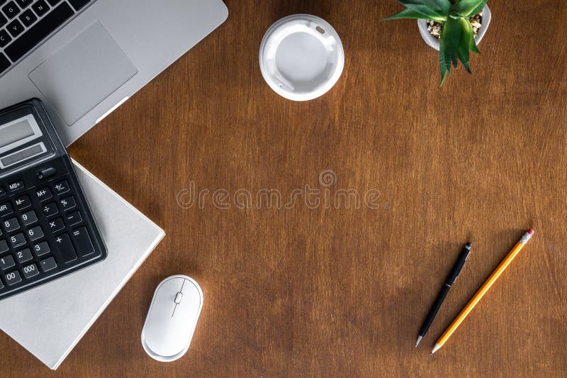 Flat Lay Office Wooden Table with Laptop, Cup, Notepad and Calculator ...