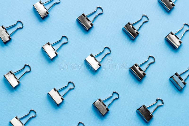 Flat Lay of Paper Binder Clips, Office Supplies Pattern Stock Photo ...