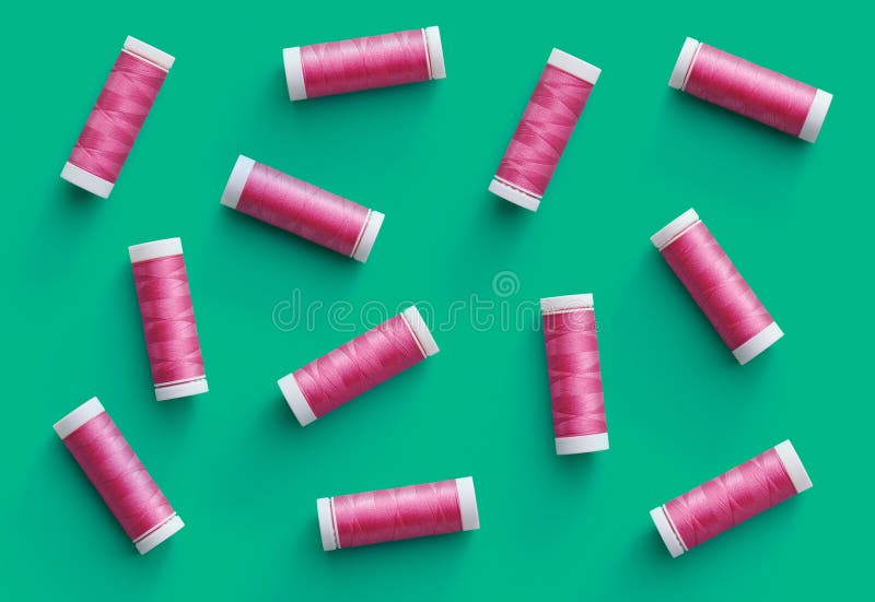 Two Spools of Pink Thread with Needle Stock Photo - Image of point ...