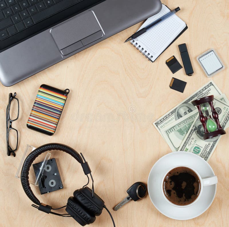 Flat Lay of Personal Stuff, Notebook Computer,cards, Coffee, Money and ...