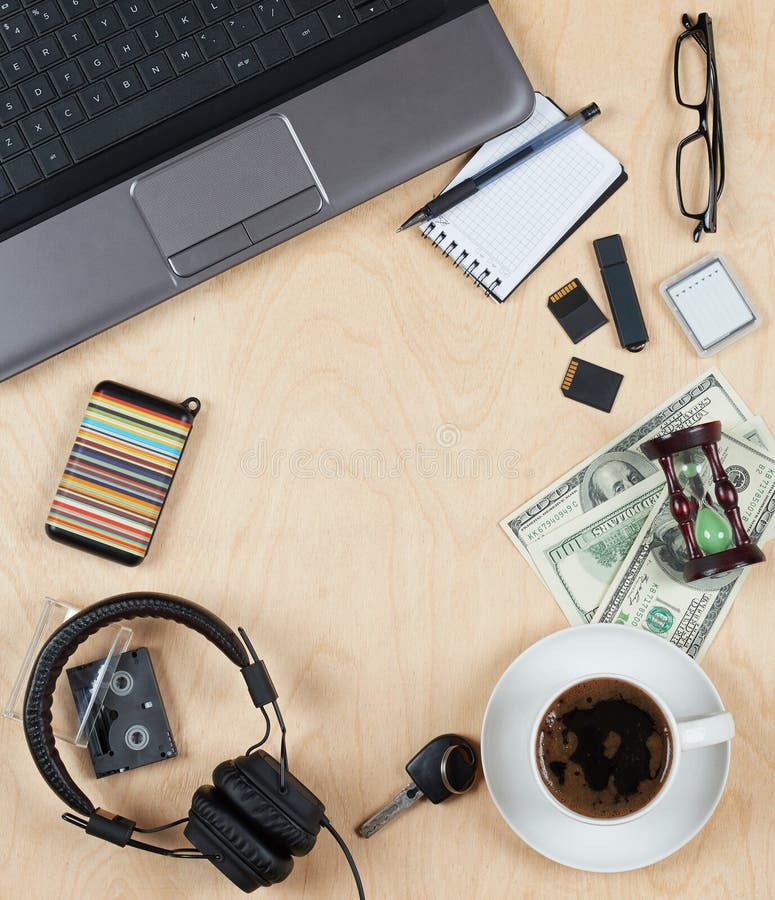 Flat Lay of Personal Stuff, Notebook Computer,cards, Coffee, Money and ...