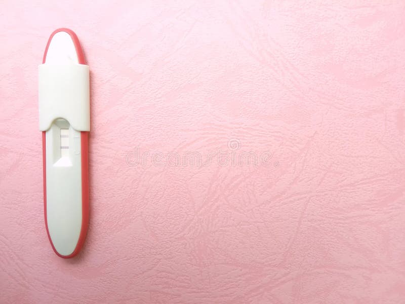 Simple Flat Lay Plastic Pregnancy Test Pack Positive Result at ...