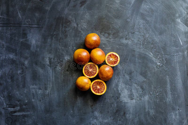 Flat Lay of Red Sliced Exotic Oranges, Dark Food on Black Surfaces ...