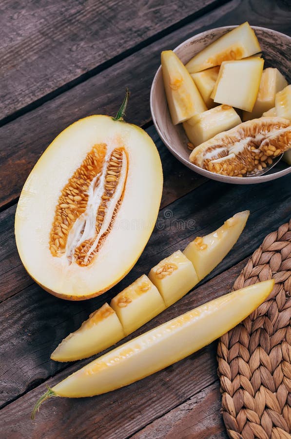 Dark Toned Flat Lay Composition with Melon and Round Homemade Bread ...